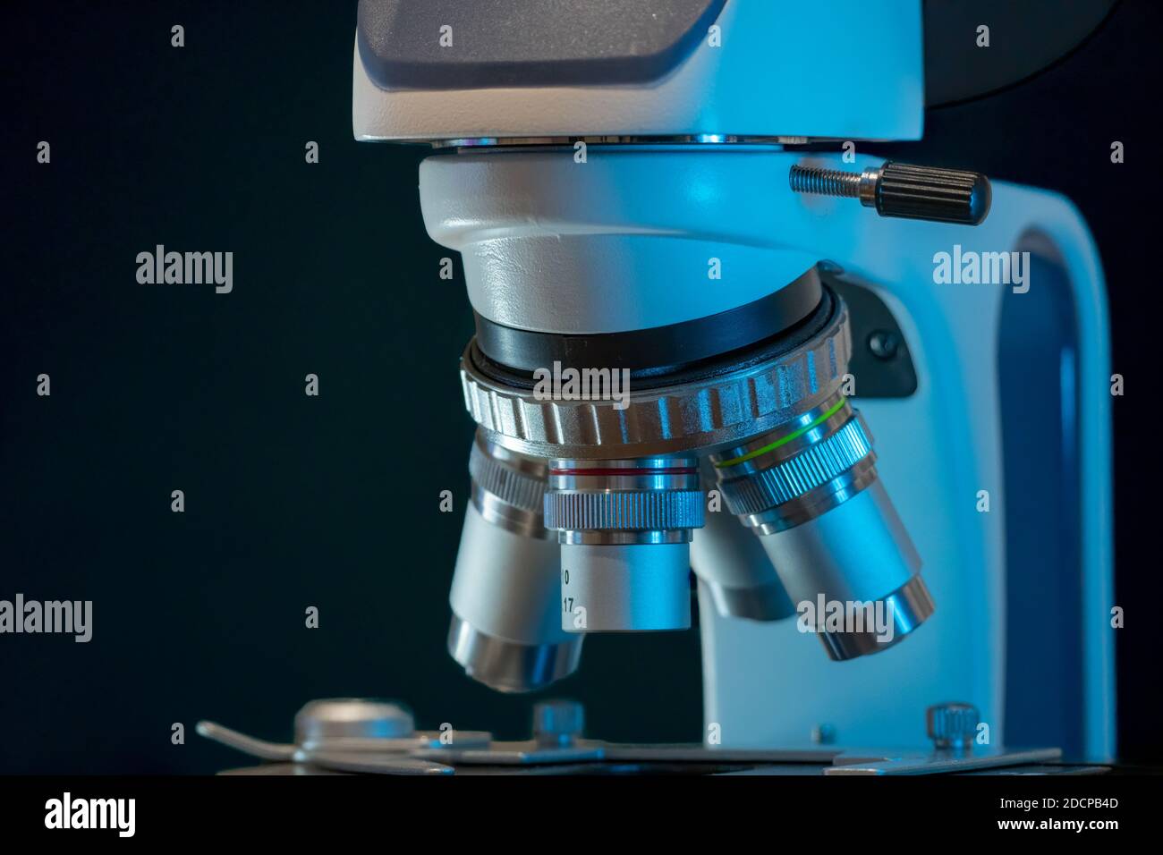 Microscope in laboratory at night. Microbiology and research concept ...