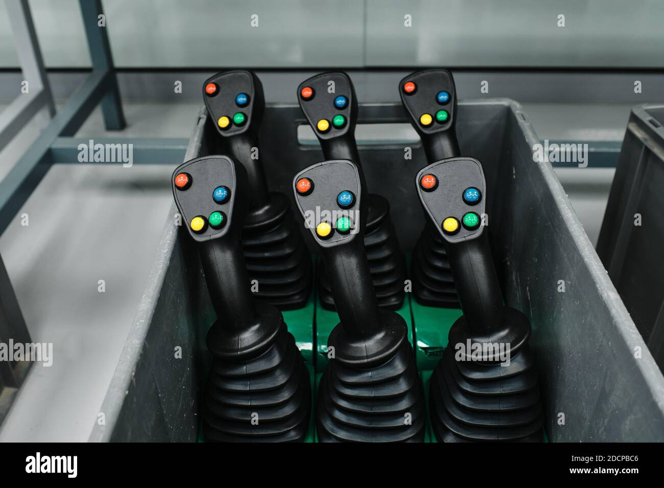 lever-shaped plastic objects placed inside a box Stock Photo - Alamy