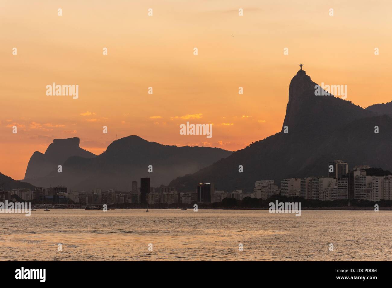 Beautiful sunset ocean view to Corcovado Mountain and geography of Rio ...