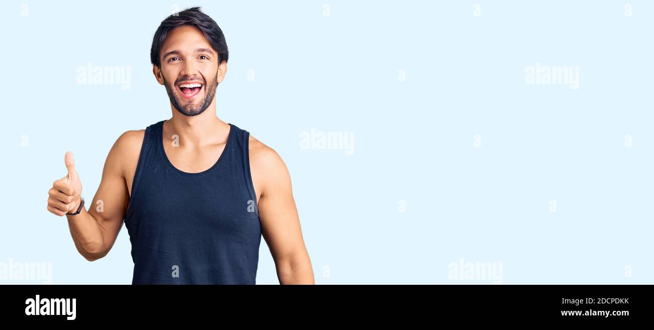 Handsome hispanic man wearing casual clothes smiling happy and positive ...