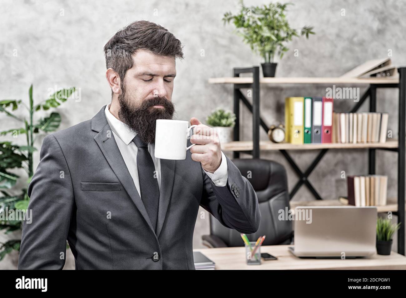 Drinking coffee relaxing break. Boss enjoying energy drink. Start day ...
