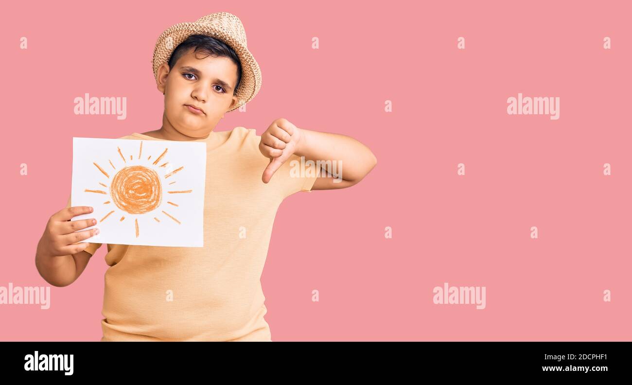 Little boy kid holding sun draw with angry face, negative sign showing ...
