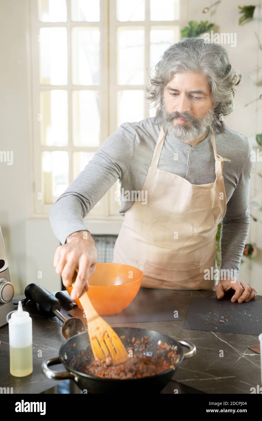 Man mixing stirring hi-res stock photography and images - Alamy
