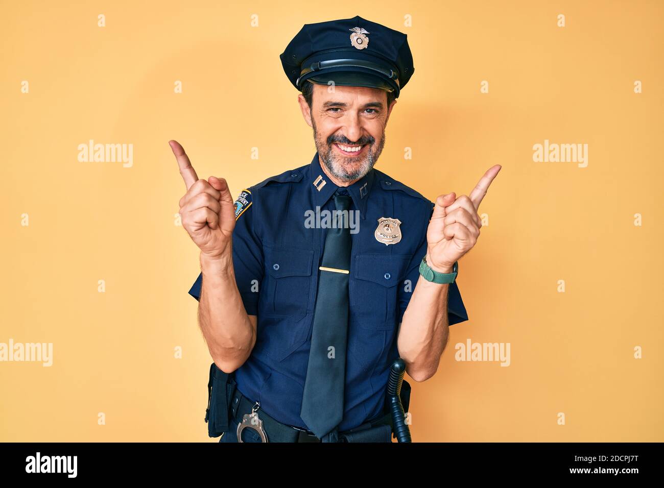 Police officer showing directions hi-res stock photography and images ...