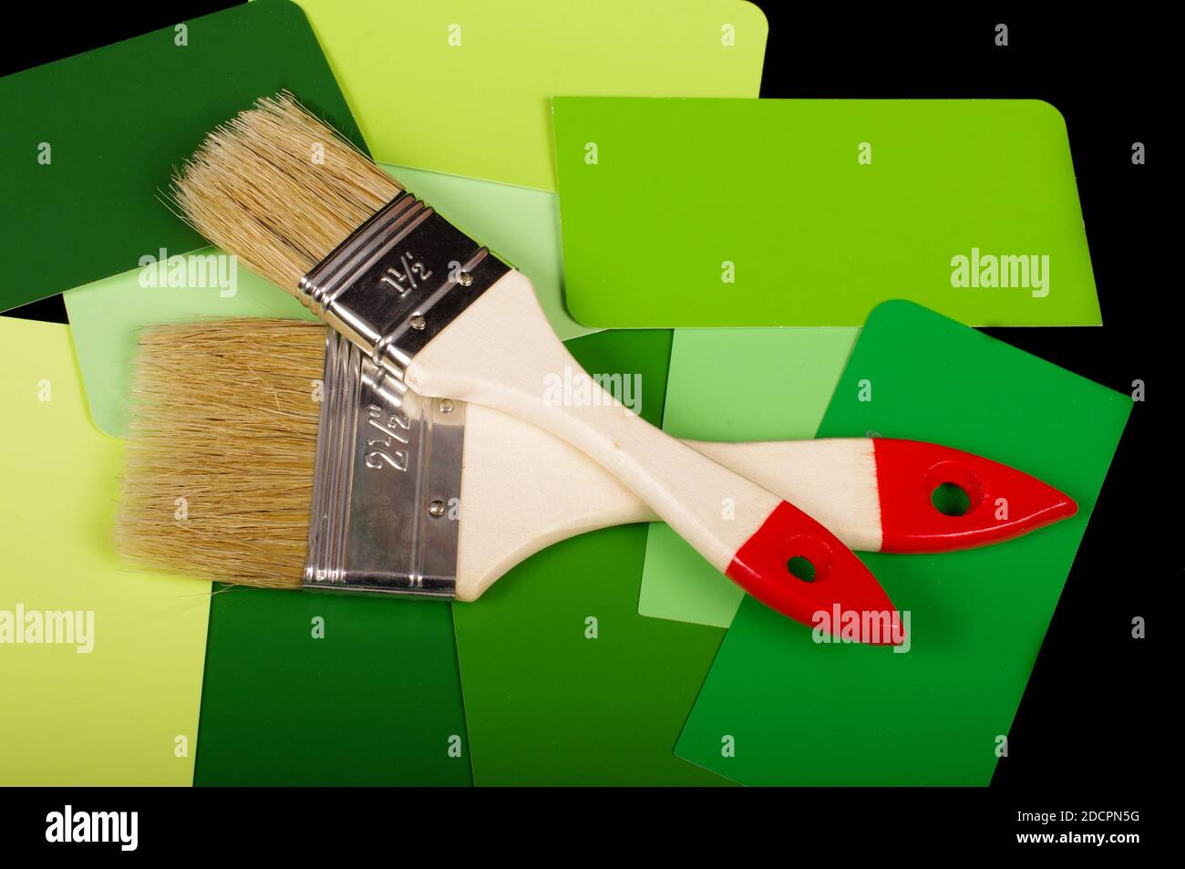 Color sample cards and paintbrush for home decoration and design ...