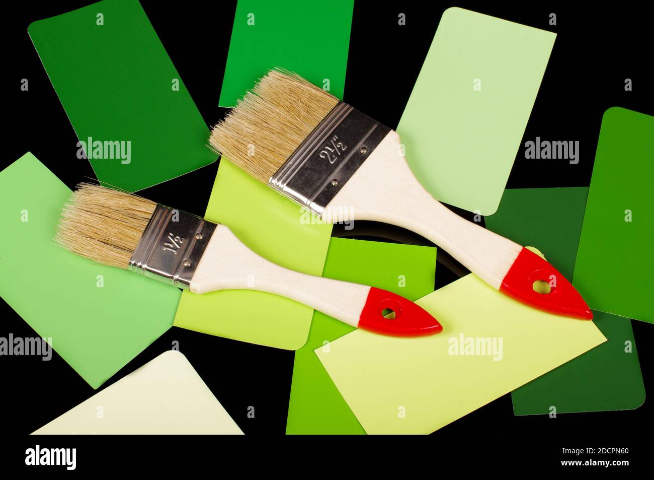 Colour sample cards and paintbrush for home decoration and design ...