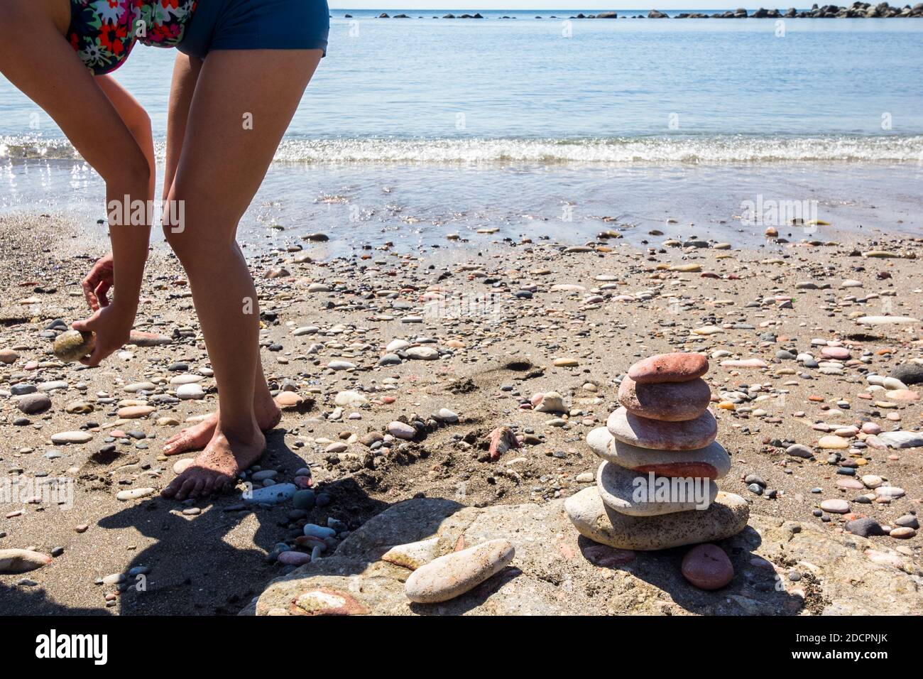 Rock balancing at a beach in the Philippines Stock Photo - Alamy
