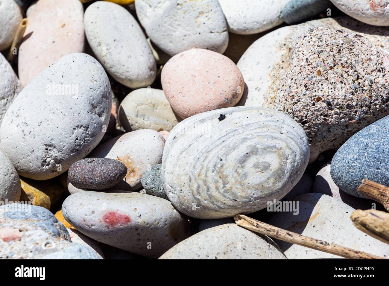 Smooth rocks and pebbles at a beach in the Philippines Stock Photo - Alamy