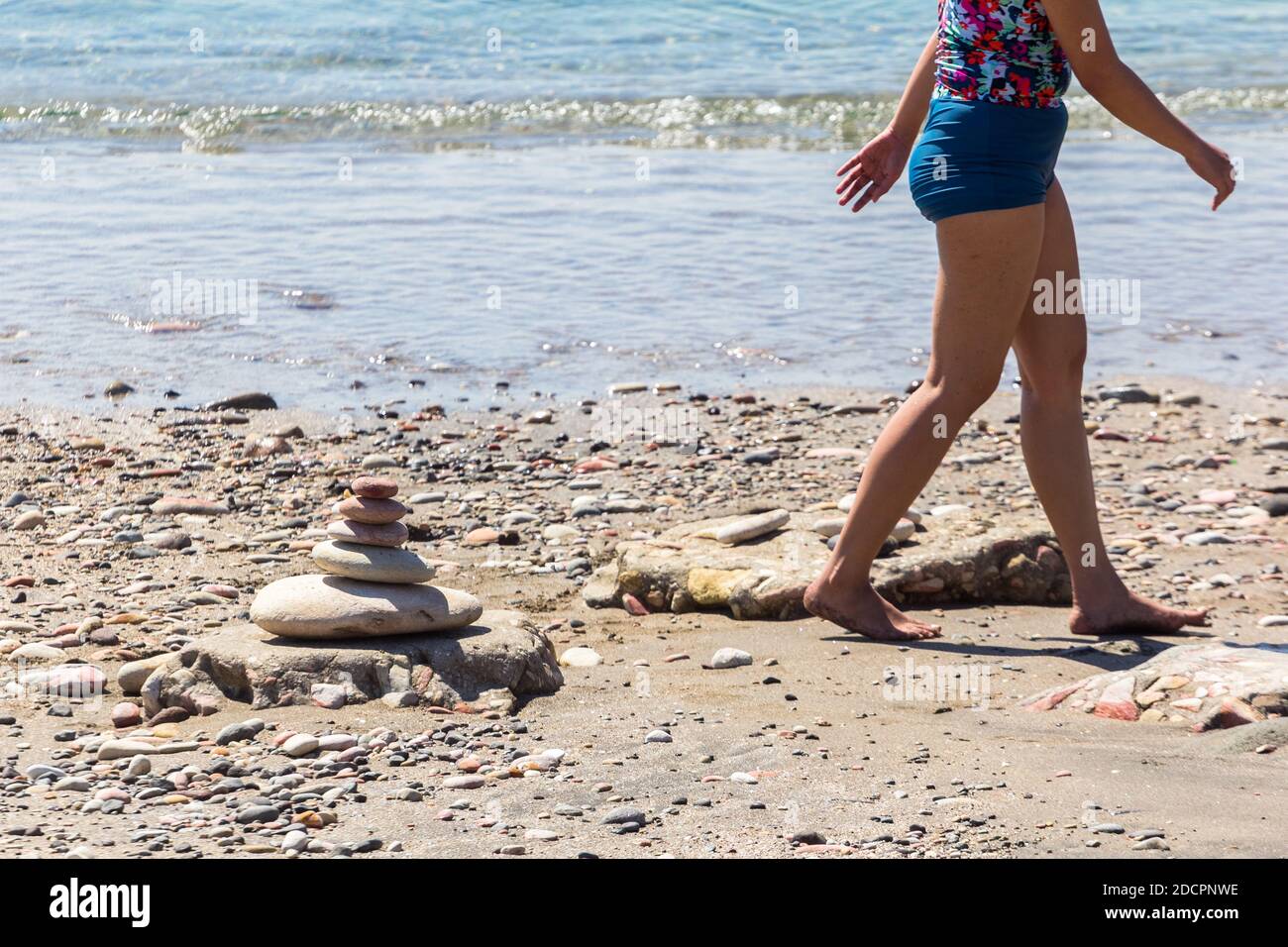Rock balancing at a beach in the Philippines Stock Photo - Alamy