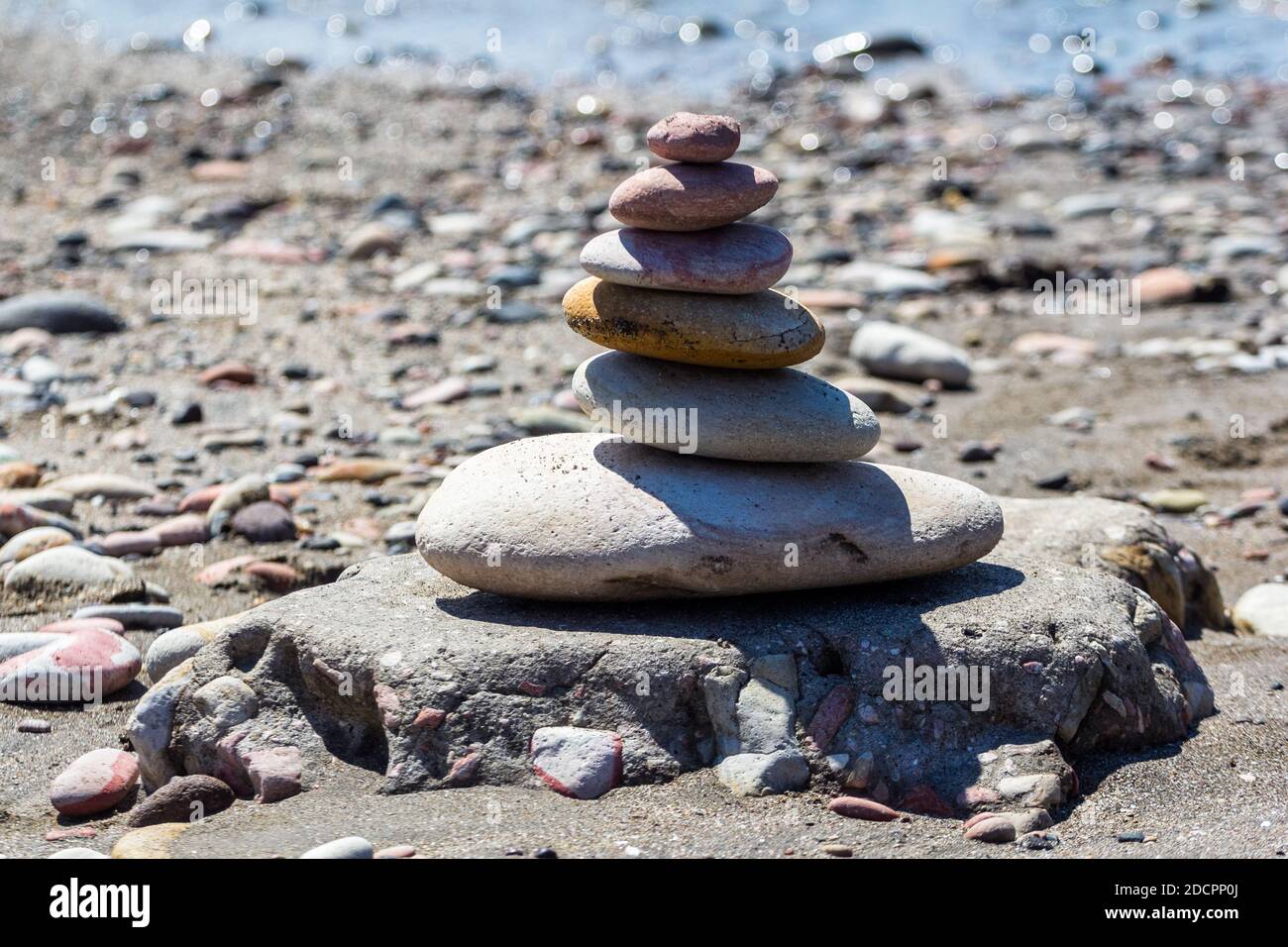 Rock balancing at a beach in the Philippines Stock Photo - Alamy