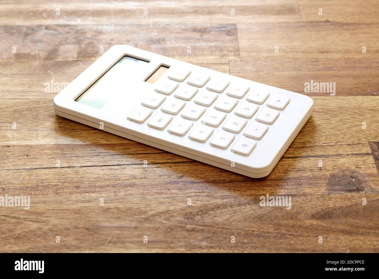 A studio photo of a desktop calculator Stock Photo - Alamy