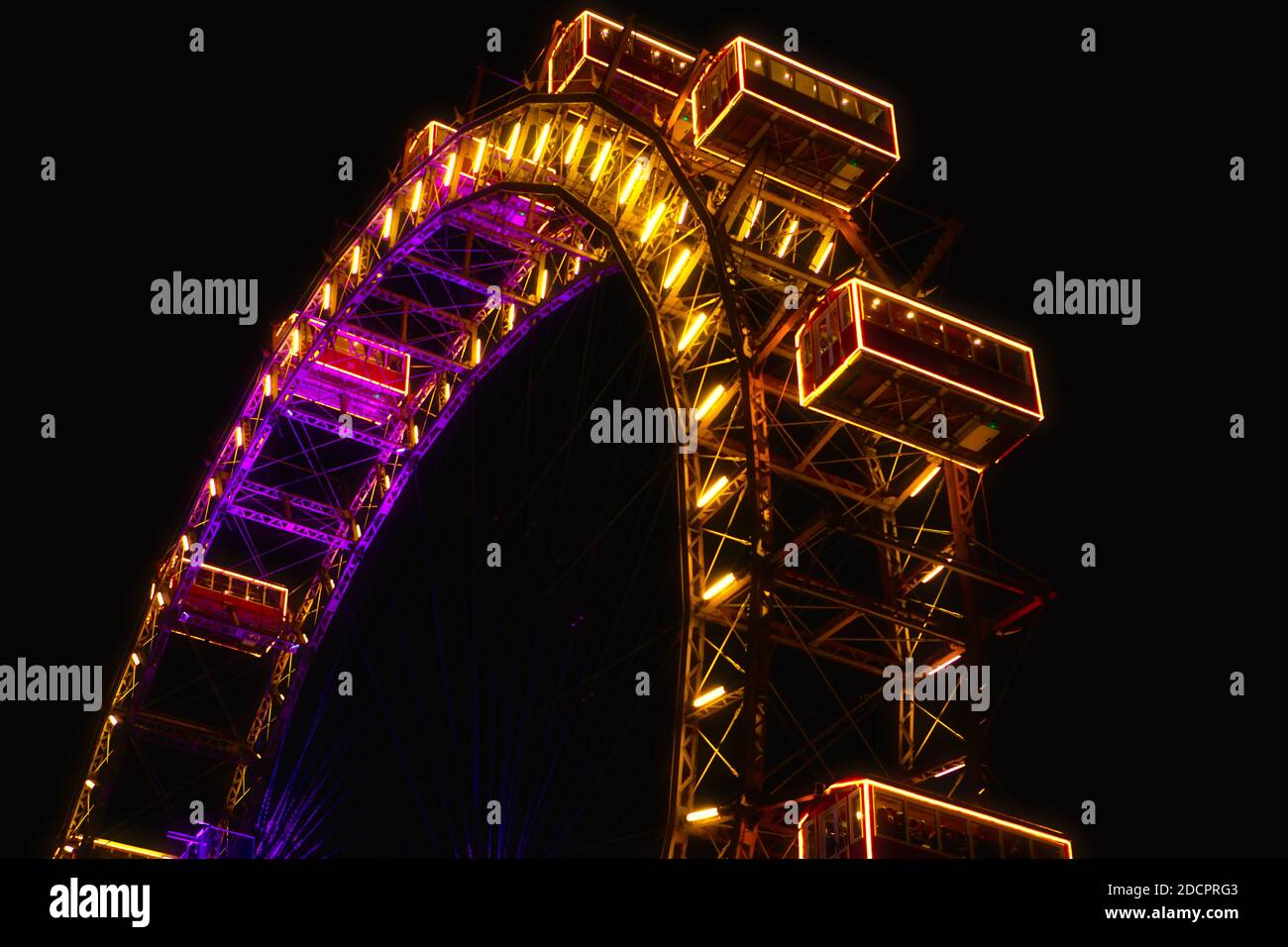 Viennese Giant Ferris Wheel illuminated in the night . Vienna famous ...
