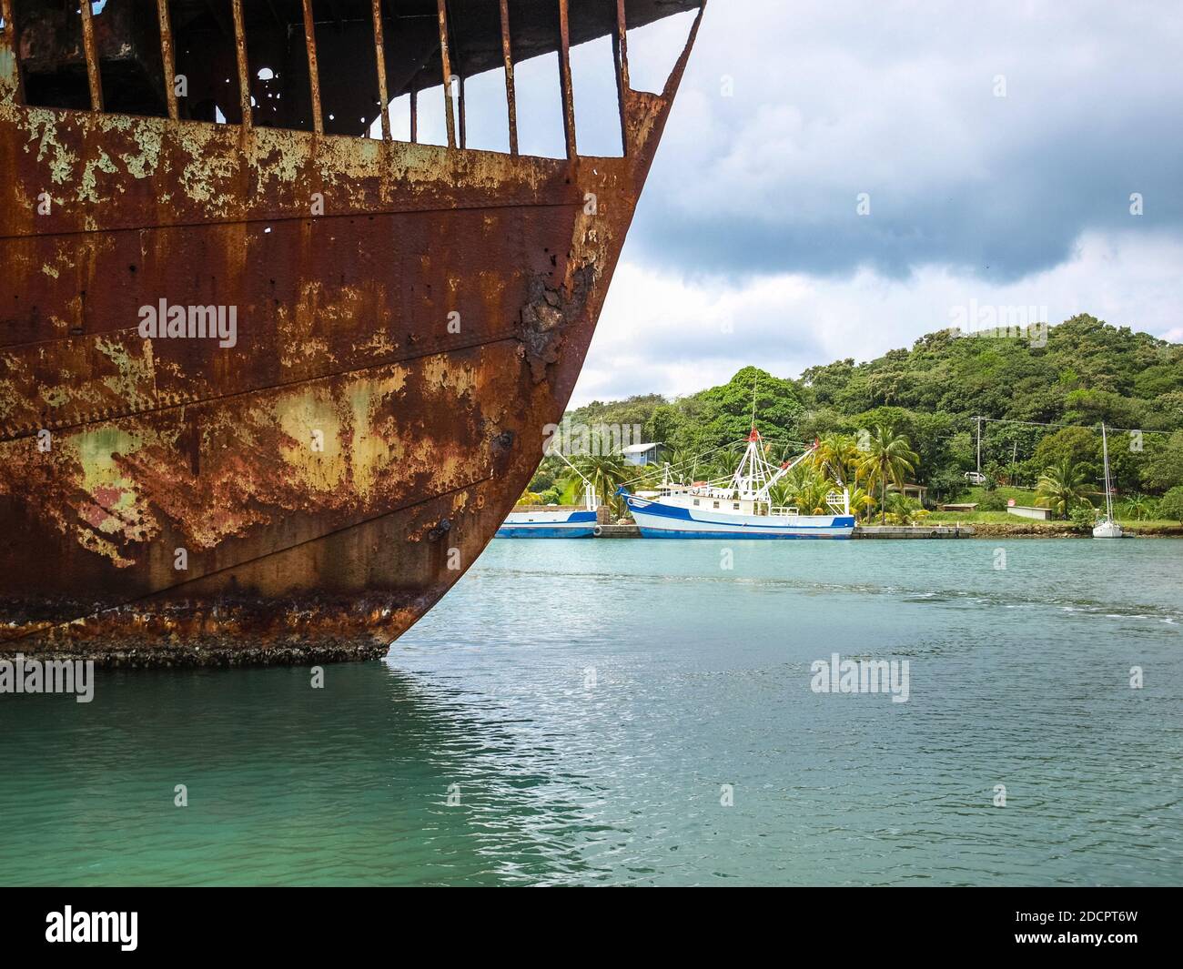 Rusted old boat docked at the Caribbean port Stock Photo - Alamy