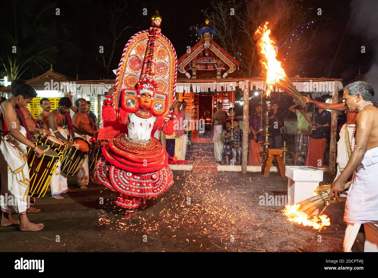 Theyyam artist perform during temple festival in Payyanur, Kerala ...