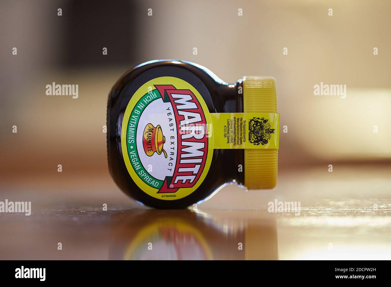 Jar of Marmite on a table Stock Photo - Alamy
