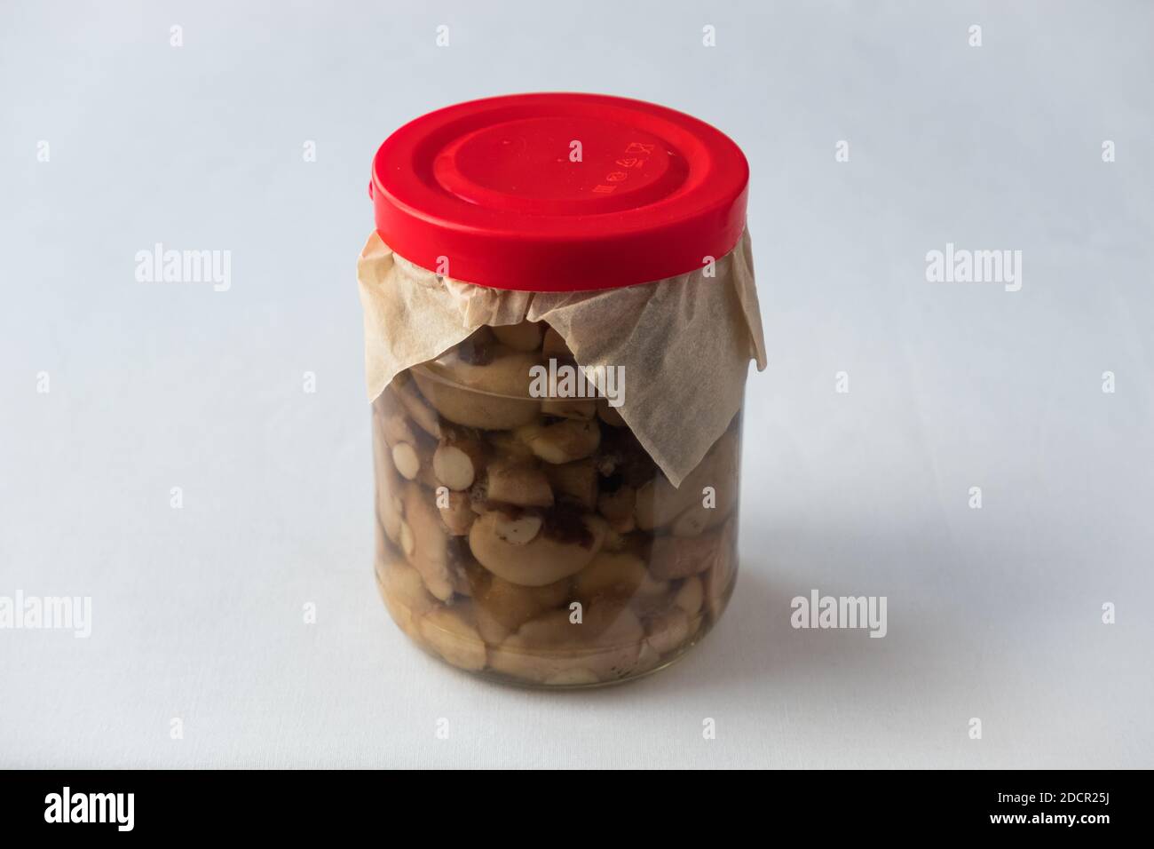 Homemade pickled salted boletus mushrooms in a jar Stock Photo - Alamy