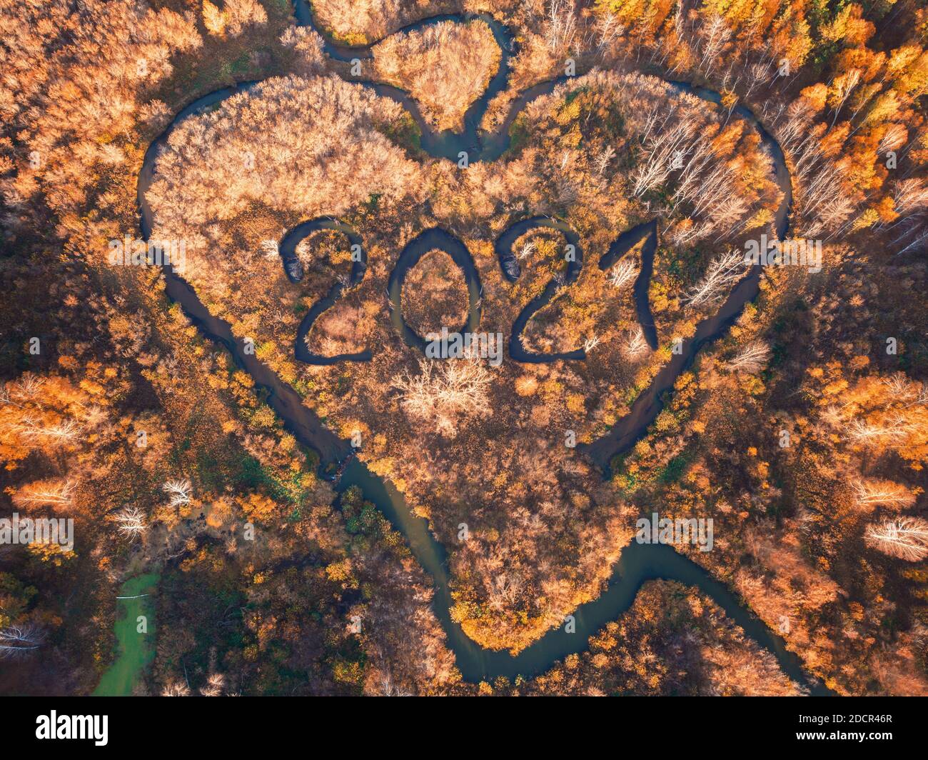 Heart shaped river with 2021 text Stock Photo - Alamy