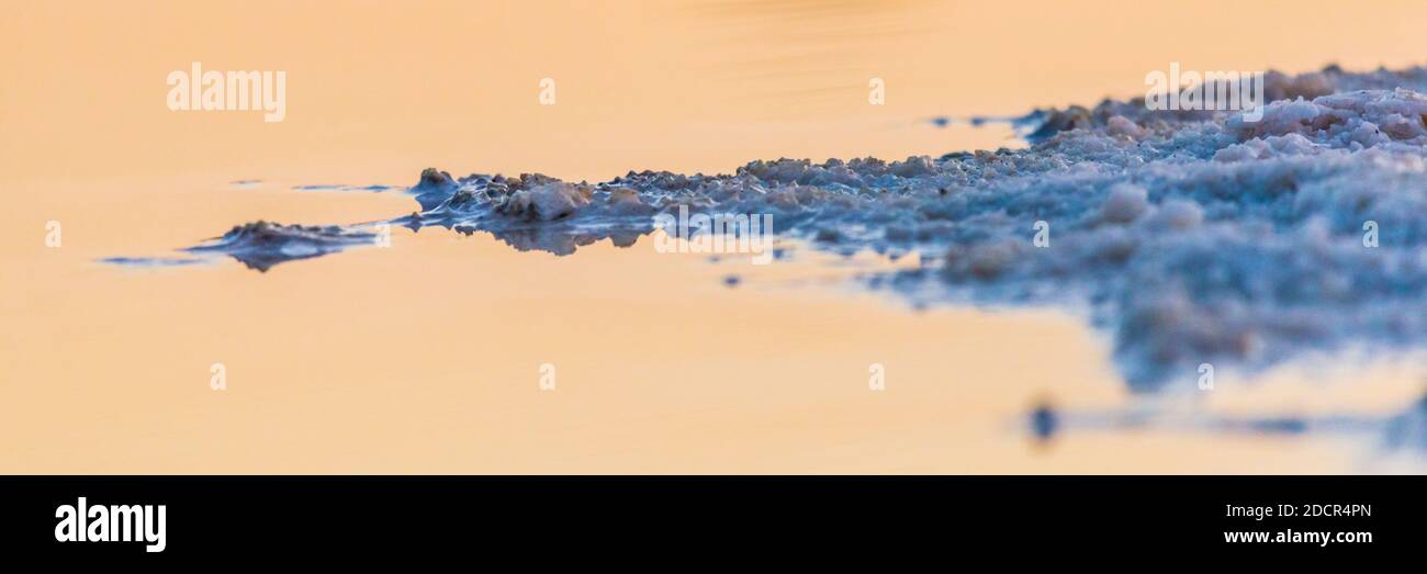 Salt in water in lake. Production of salt in Baskunchak region Stock ...
