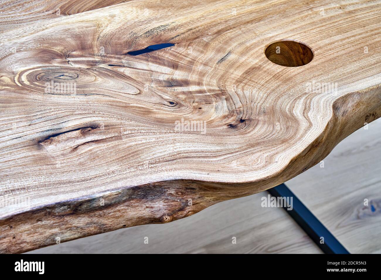 Live edge elm gaming desk countertop with metal base in a modern home ...