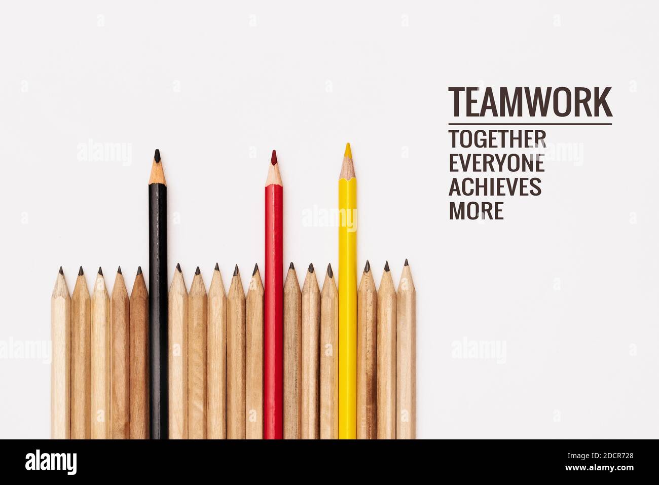 Teamwork concept. group of pencil on white background with word ...
