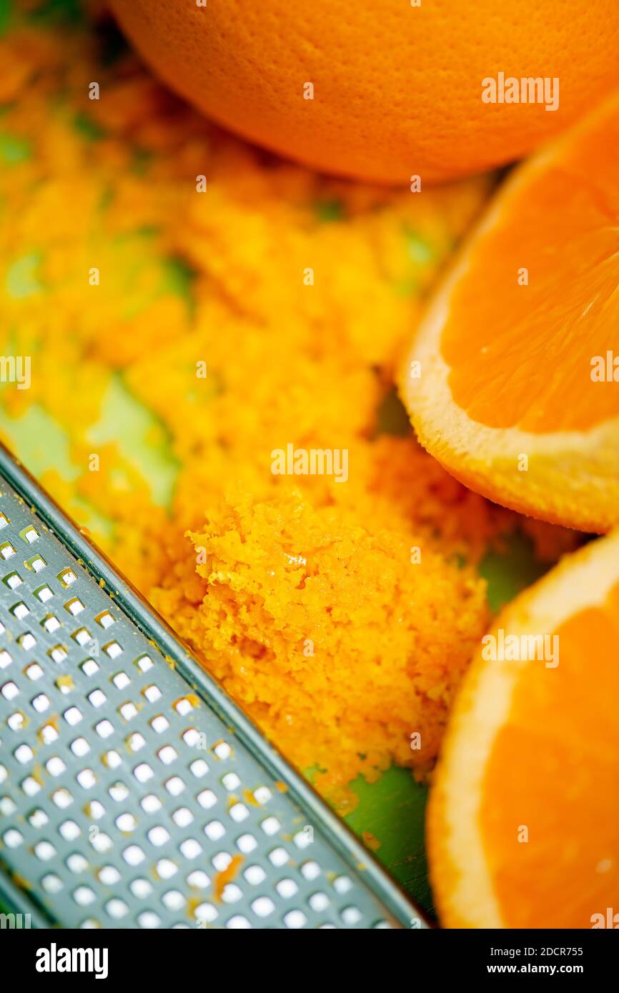 Closeup of grated fresh orange zest, food background Stock Photo - Alamy