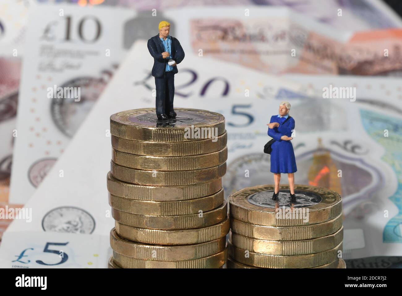 Undated file photo of models of a man and woman stand on a pile of ...