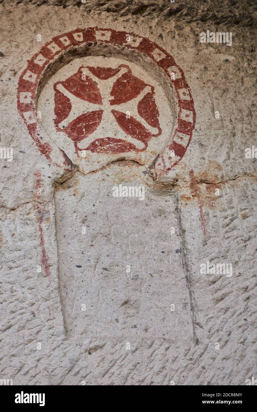 Ancient cross on rock wall Stock Photo - Alamy
