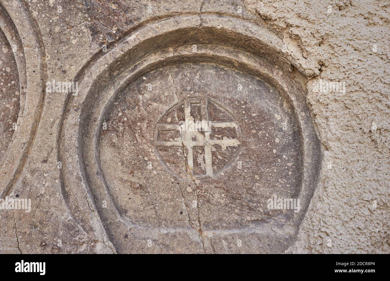 Ancient cross on rock wall Stock Photo - Alamy