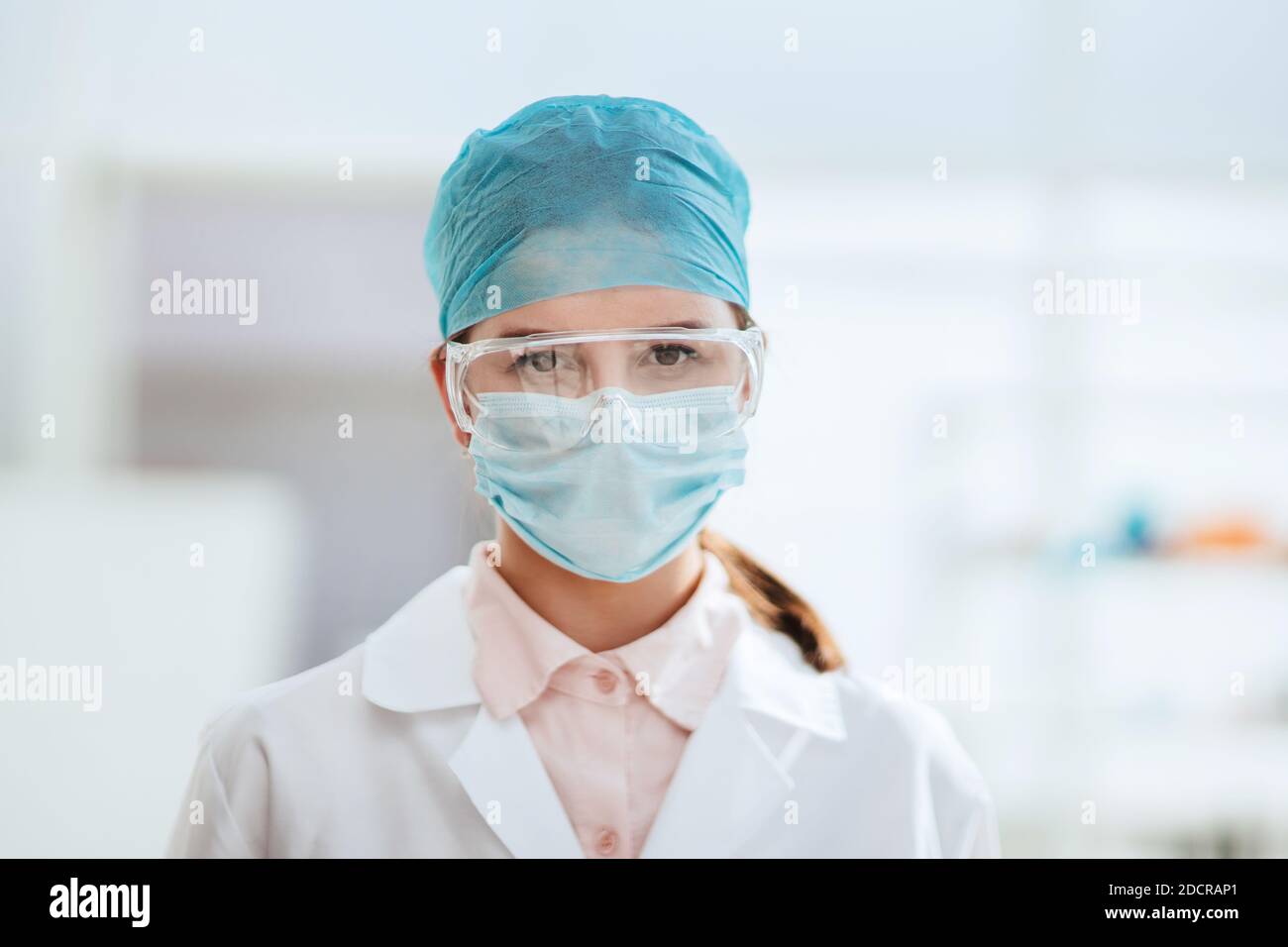 Female chemist in protective mask hi-res stock photography and images ...