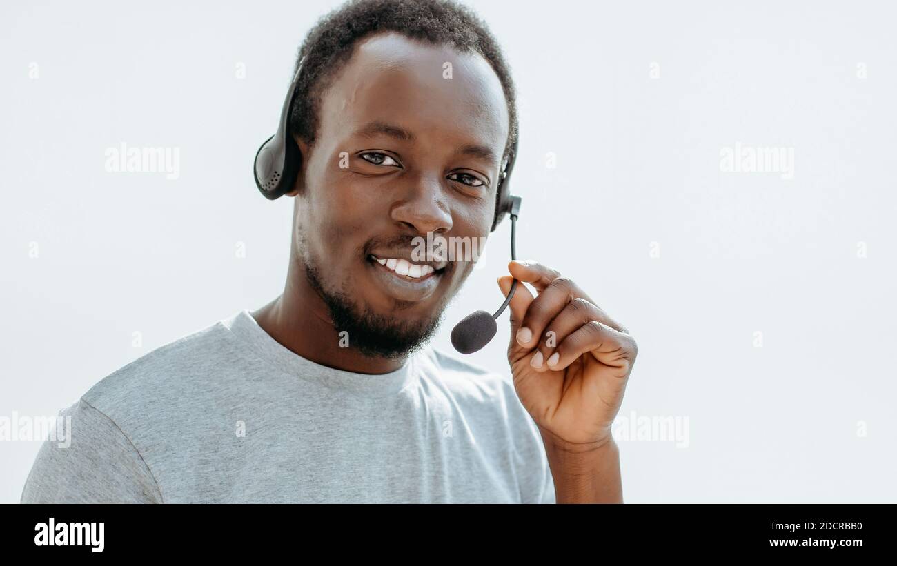 close up. a handsome young man with a headset Stock Photo - Alamy