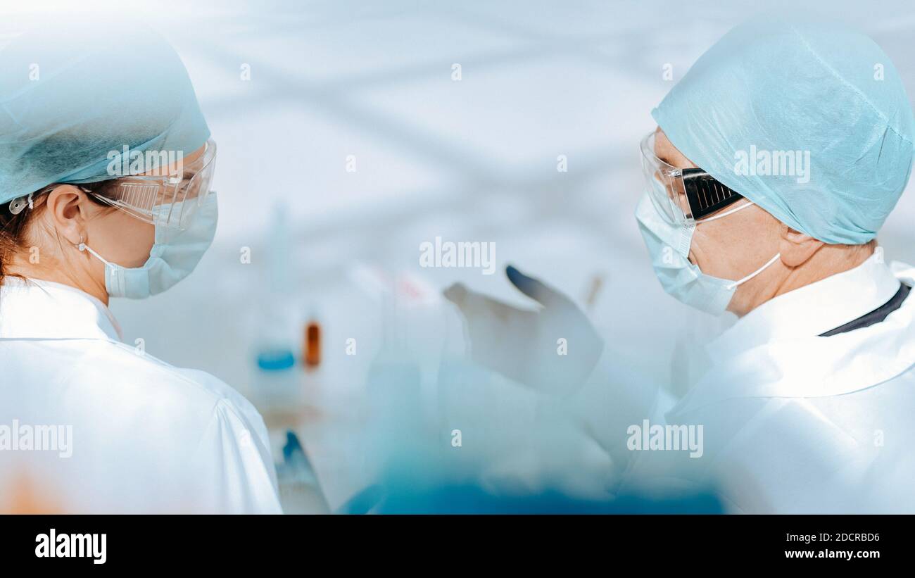 background image of medical colleagues talking in the lab Stock Photo ...