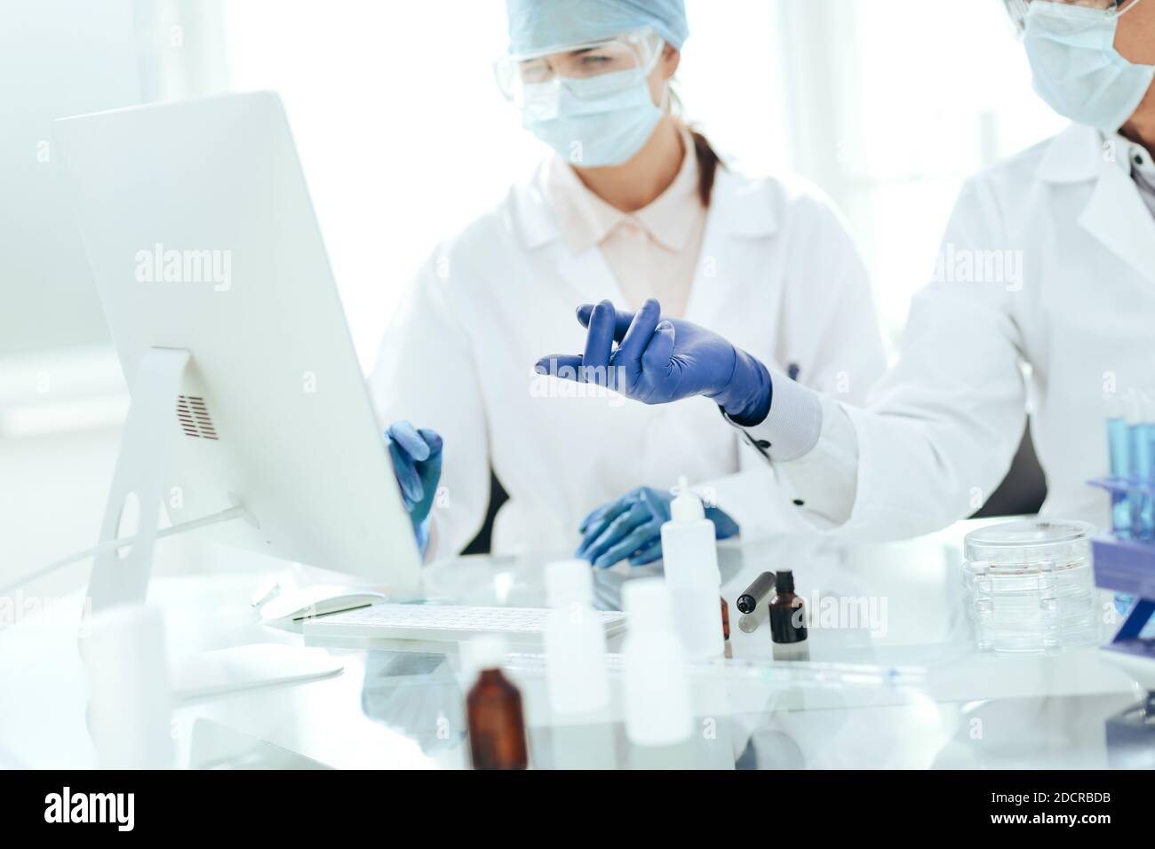 scientists discussing the results of research in a modern laboratory ...