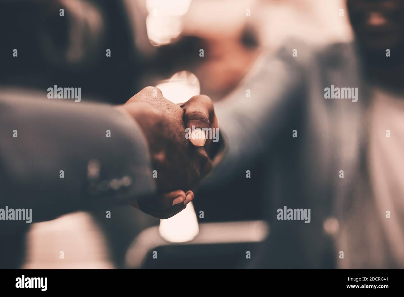 close up. background image of a handshake of young entrepreneurs Stock ...