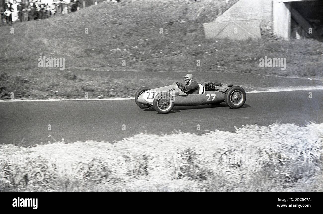1960s, historical, ?? cars racing around a motor racing circuit, Engand ...