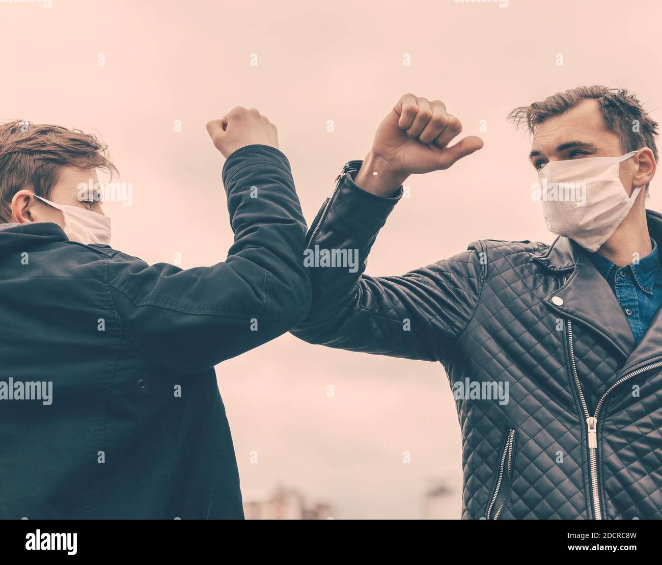 young people with a gesture of greeting each other Stock Photo - Alamy