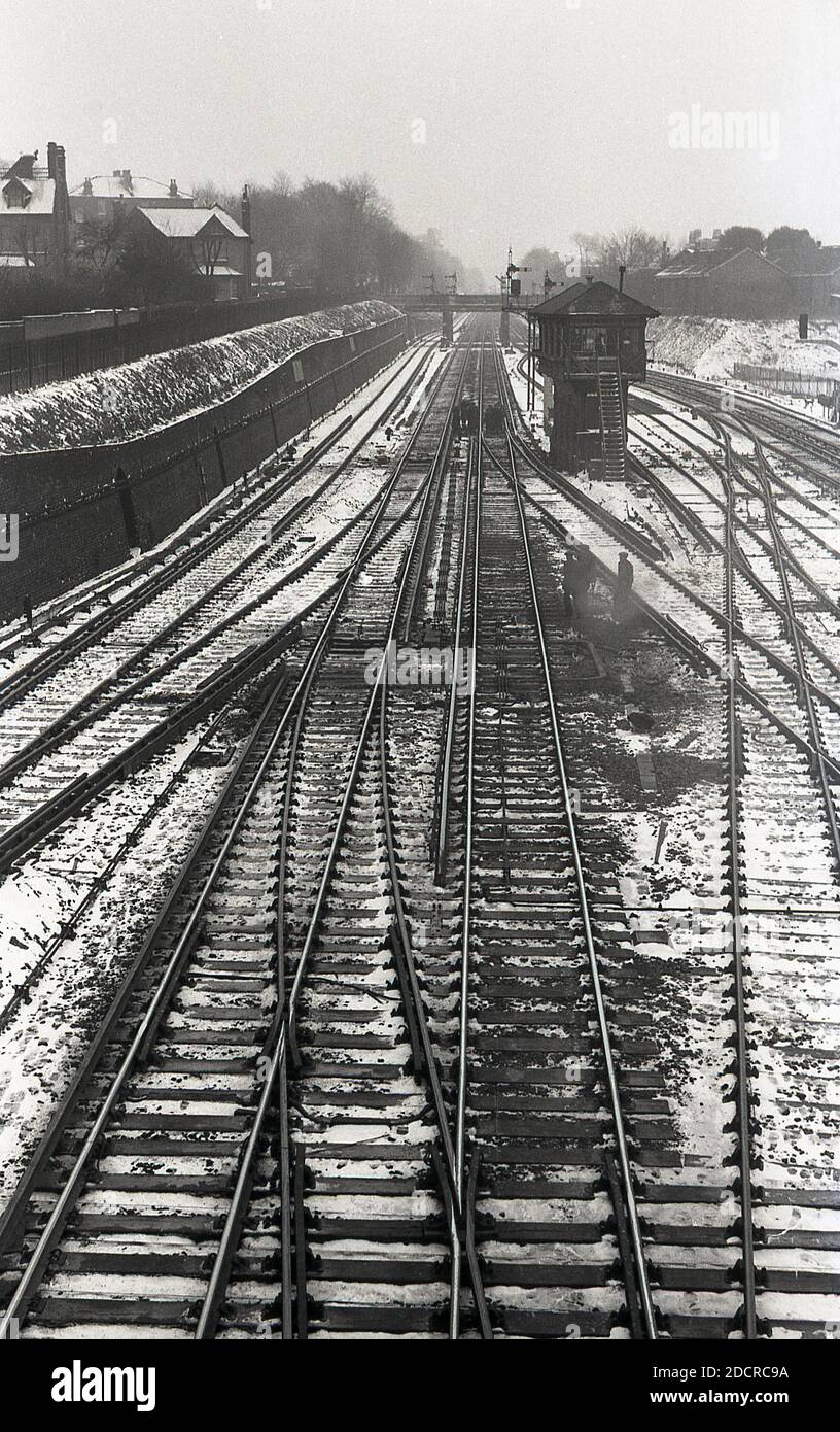 1960s, historical, wintertime and a wooden railway signal box sitting ...