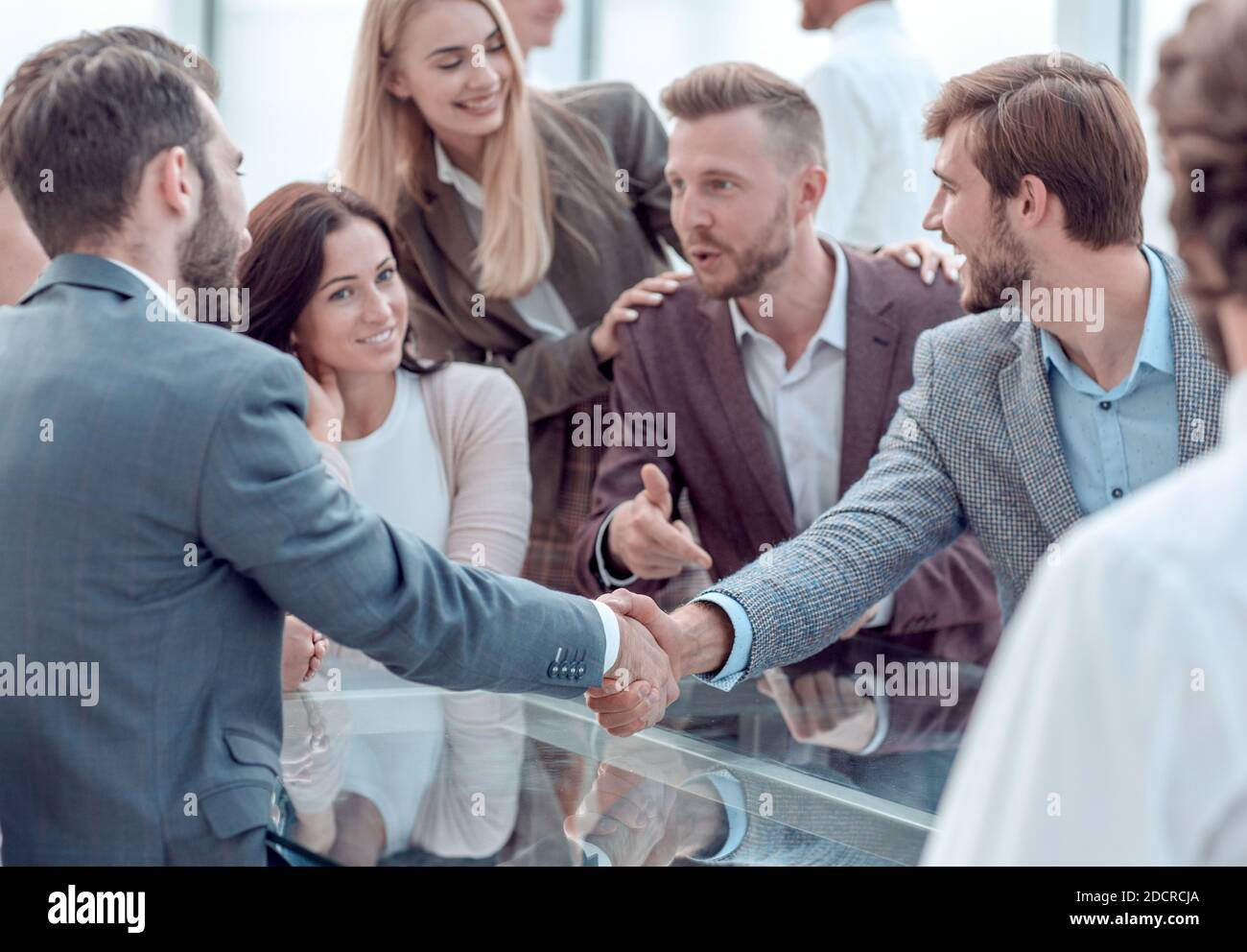 handshake business partners during a meeting in the office Stock Photo ...