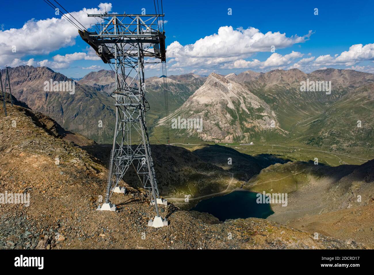 Aerial view of the valley Val Bernina and the road to Bernina Pass ...