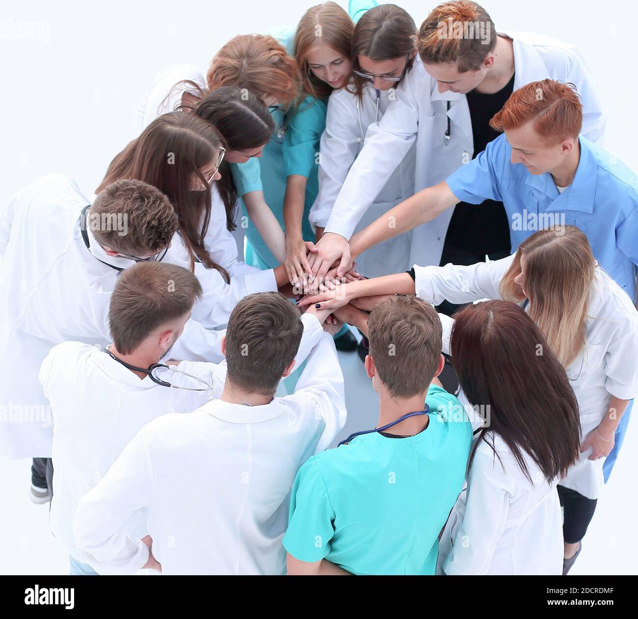 top view. a group of smiling doctors pointing at you Stock Photo - Alamy