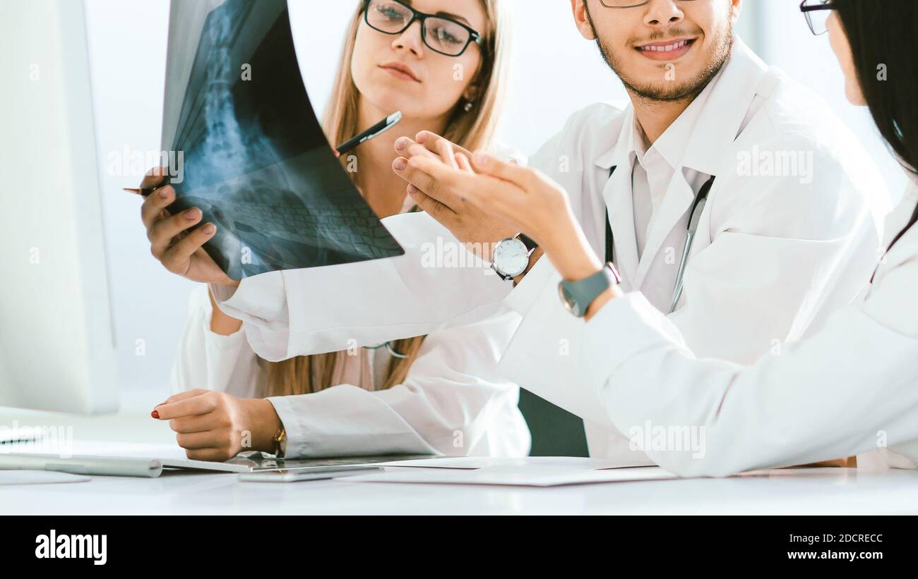 Female medical intern discussing patients hi-res stock photography and ...