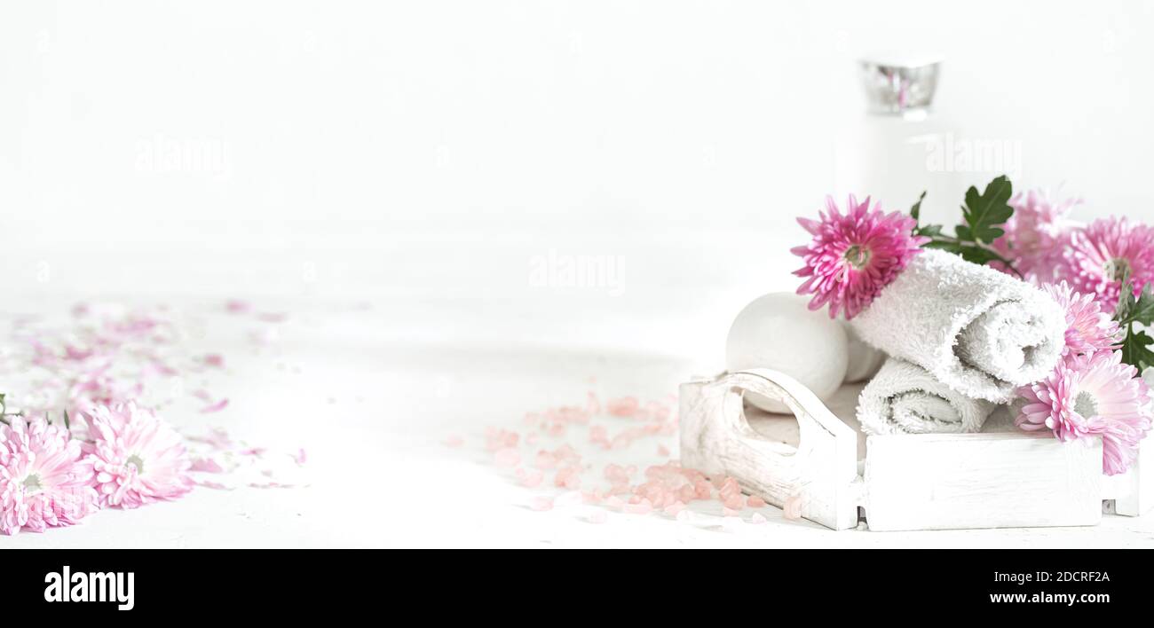 Spa background with products for personal hygiene and beauty with pink ...