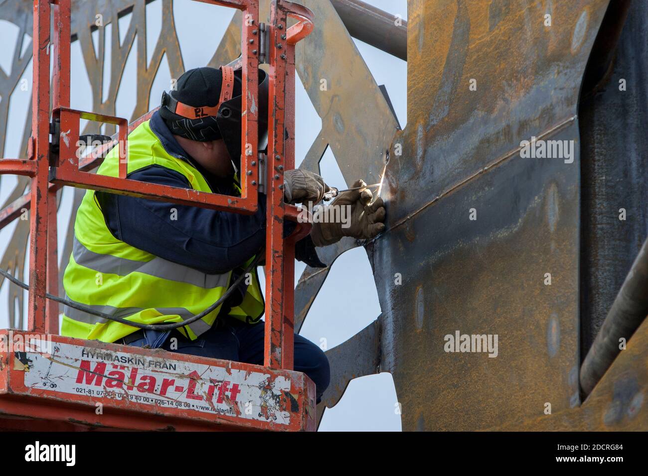 A man is welding Stock Photo - Alamy