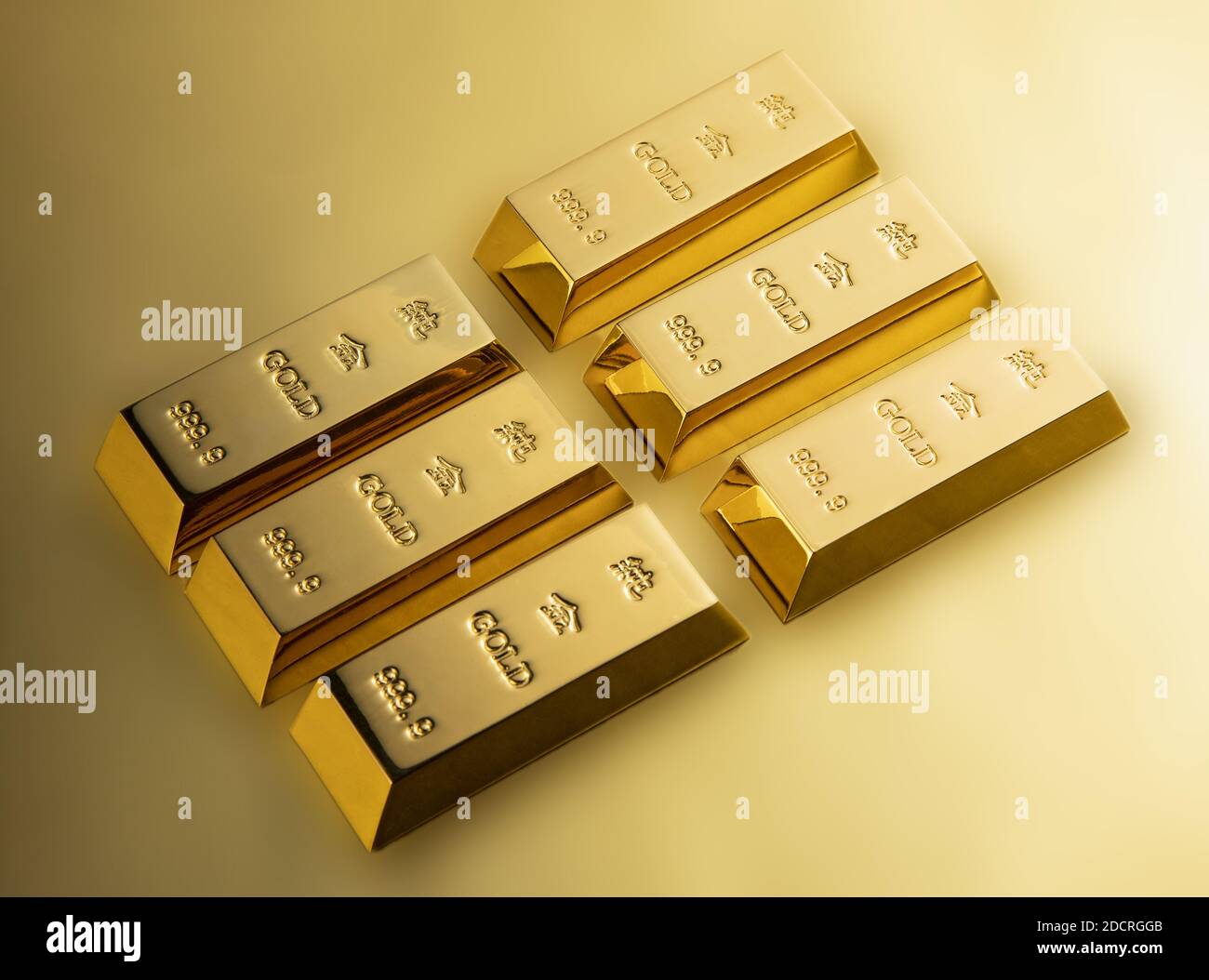 Six gold bars isolated on a golden background Stock Photo - Alamy