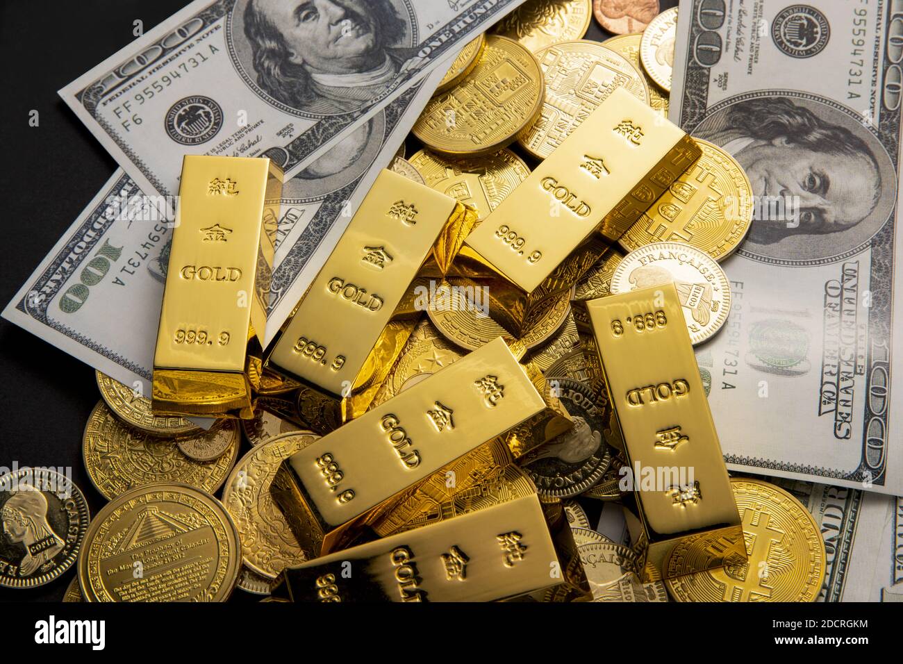 Pile gold bars and coins hi-res stock photography and images - Alamy