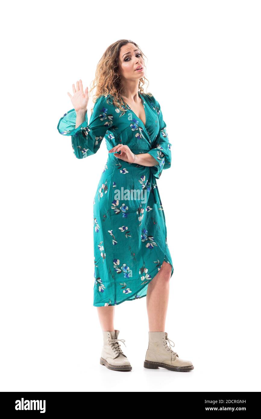 Angry arguing young woman looking at camera with talk to the hand ...