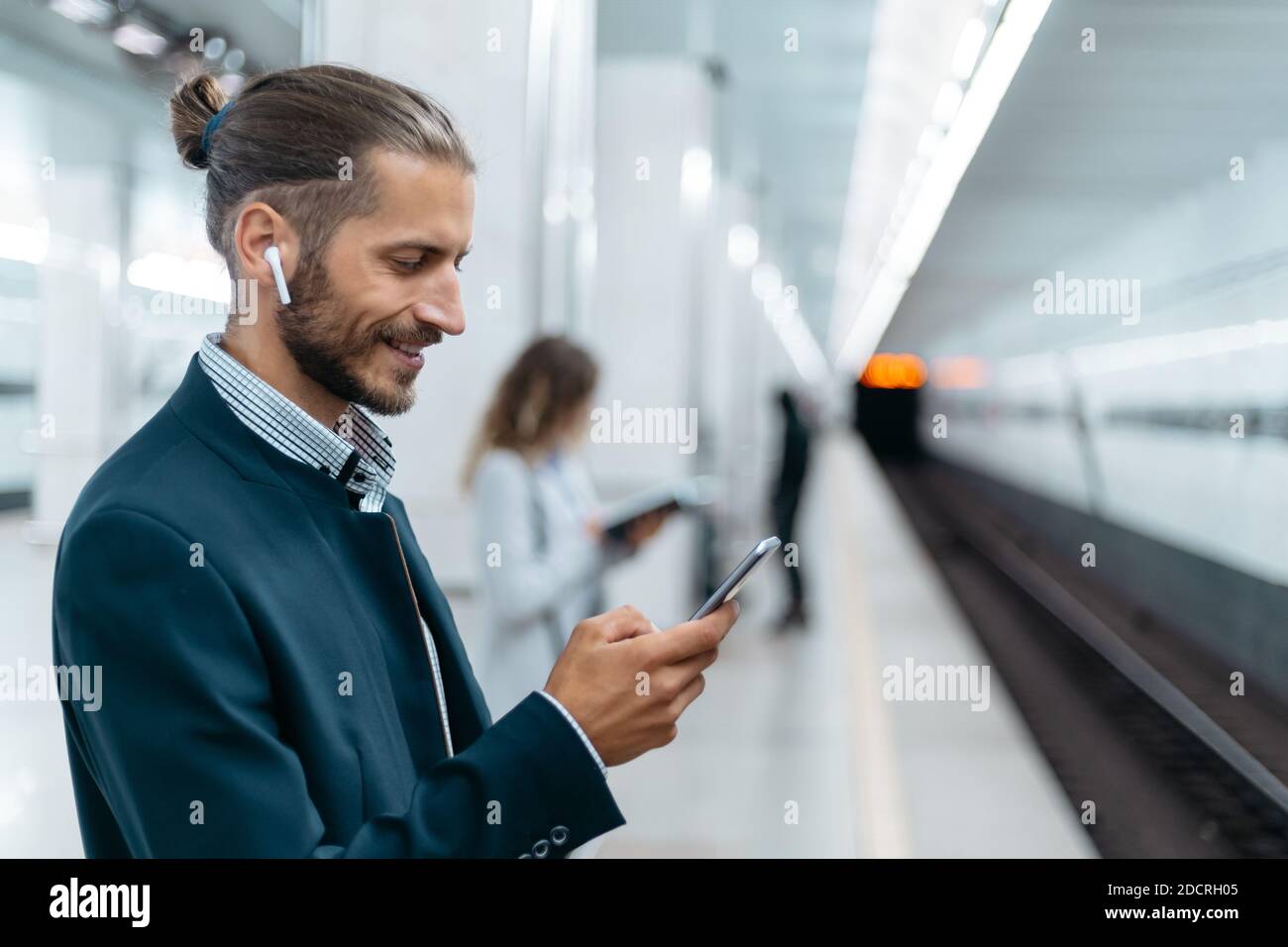 serious business man reading a message on his smartphone Stock Photo ...