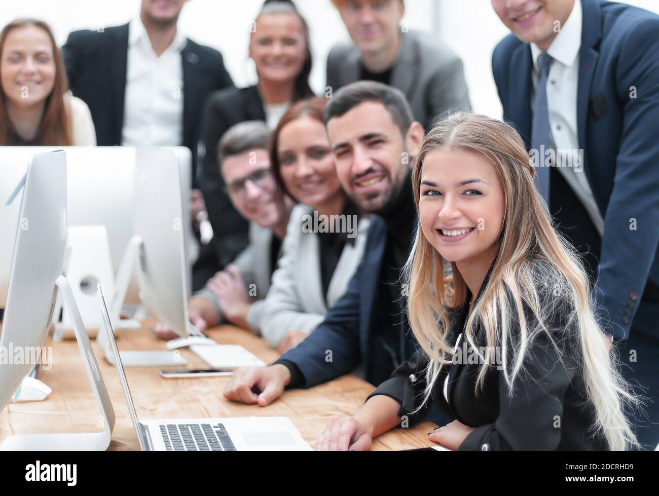 large group of employees in the workplace in the office Stock Photo - Alamy