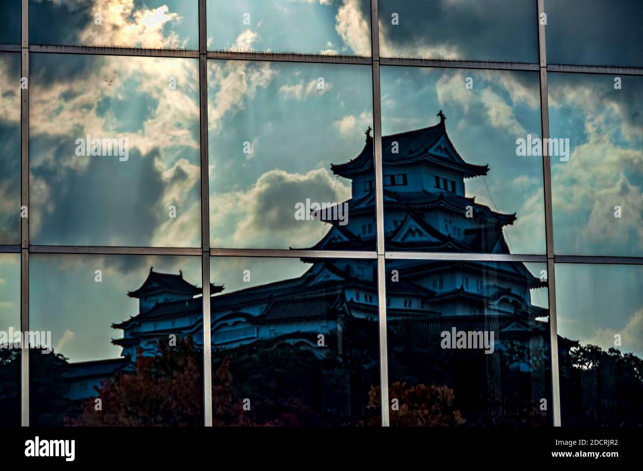 Himeji castle reflected in the History Museum windows, called the White ...