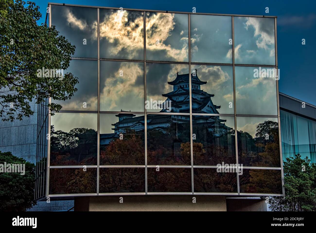 Himeji castle reflected in the History Museum windows, called the White ...