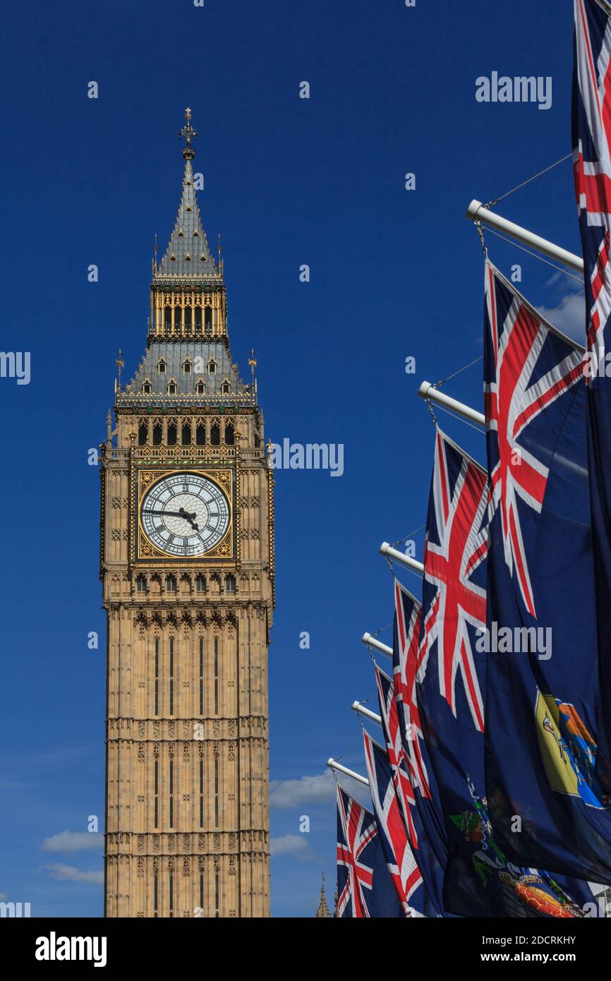 Big Ben, the Elizabeth tower bell tower with iconic clock and flags ...